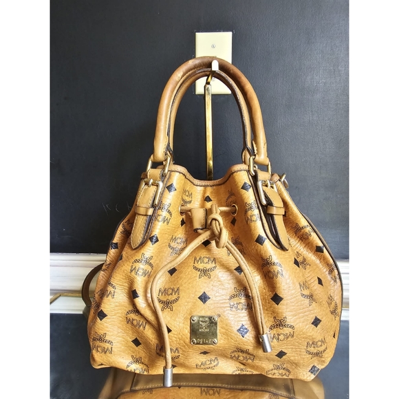 MCM | Bags | Mcm Small Visetos Drawstring Bucket Bag Cognac | Poshmark